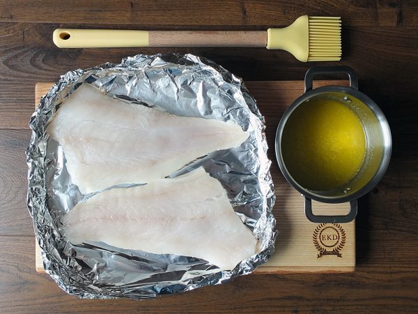 Lemon & Cracked Black Pepper Cod Fillets with Potato Wedges & Lemon ...